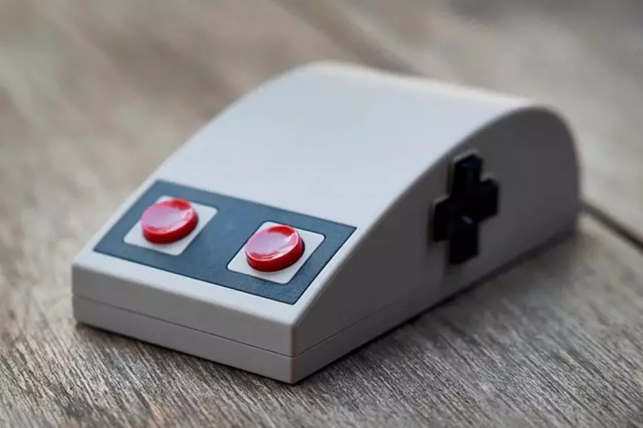 8bitdo-mus i stilen til joystickkonsollen "Dandy"